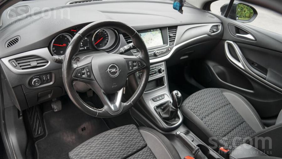 Black Opel Astra 2021 in Riga, with an engine capacity of 1.50 L and mileage of 205 thousand km for 6950 €, photo 13 on AUTOMOTO.COM.LV
