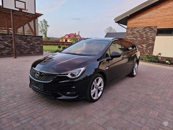 Black Opel Astra 2021 in Pakruojis, with an engine capacity of 1.20 L and mileage of 72 thousand km for 7450 €, photo 1 on AUTOMOTO.COM.LV