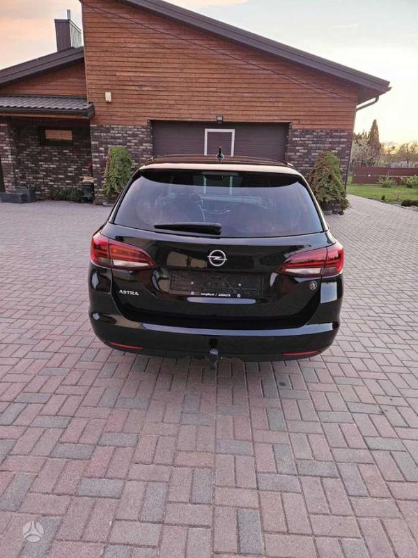Black Opel Astra 2021 in Pakruojis, with an engine capacity of 1.20 L and mileage of 72 thousand km for 7450 €, photo 8 on AUTOMOTO.COM.LV