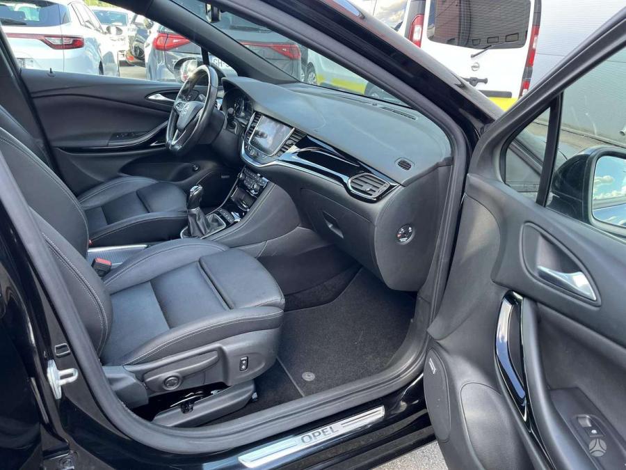 Black Opel Astra 2021 in Taurage, with an engine capacity of 1.20 L and mileage of 159 thousand km for 7800 €, photo 8 on AUTOMOTO.COM.LV