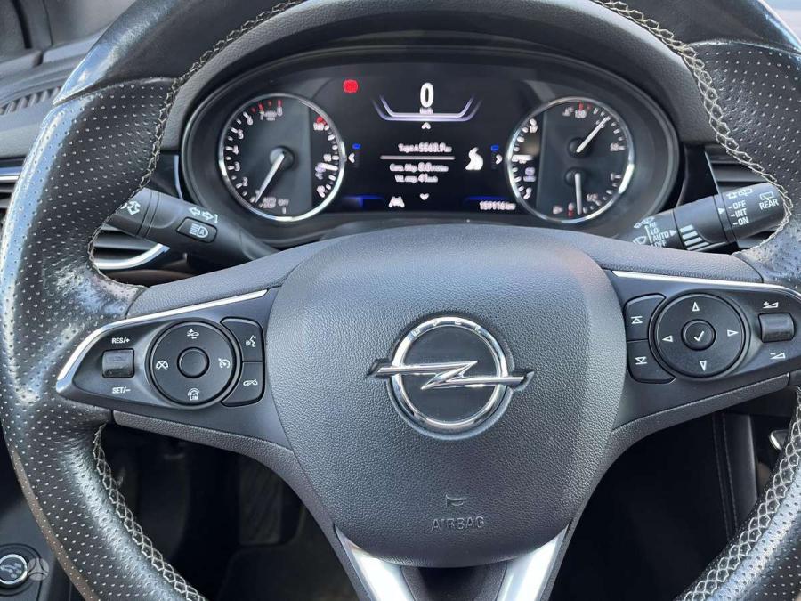 Black Opel Astra 2021 in Taurage, with an engine capacity of 1.20 L and mileage of 159 thousand km for 7800 €, photo 17 on AUTOMOTO.COM.LV