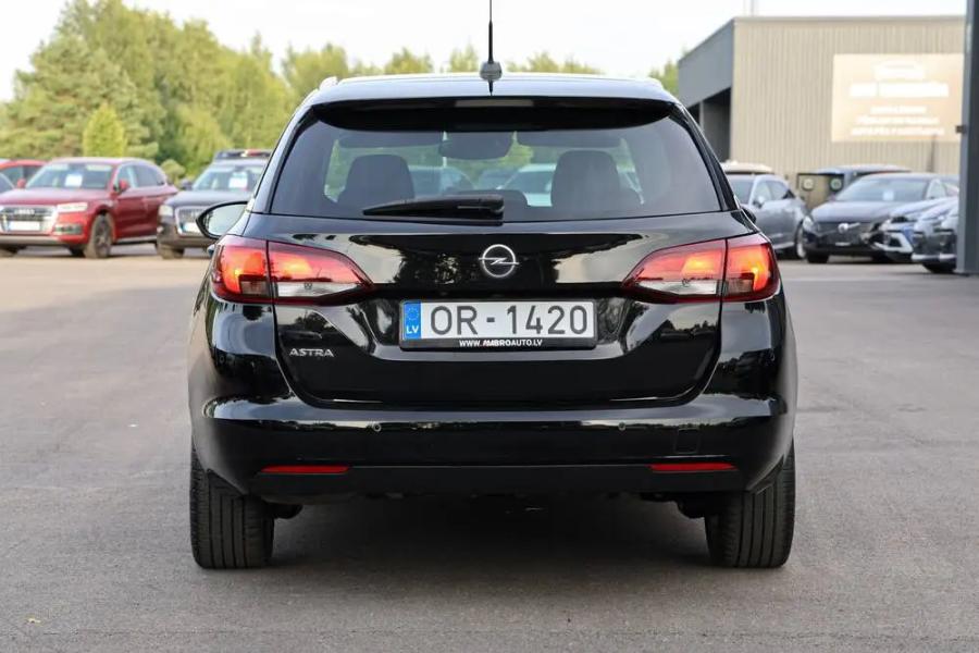 Black Opel Astra 2021 in Jelgava, with an engine capacity of 1.20 L and mileage of 92 thousand km for 8990 €, photo 6 on AUTOMOTO.COM.LV