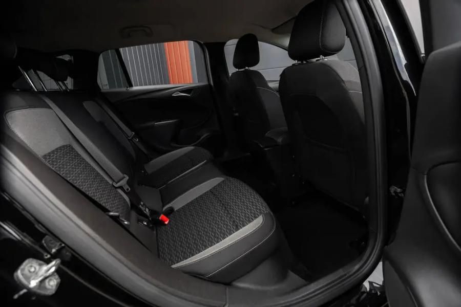 Black Opel Astra 2021 in Jelgava, with an engine capacity of 1.20 L and mileage of 55 thousand km for 8750 €, photo 9 on AUTOMOTO.COM.LV
