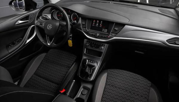 Black Opel Astra 2021 in Jelgava, with an engine capacity of 1.20 L and mileage of 55 thousand km for 8750 €, photo 9 on AUTOMOTO.COM.LV
