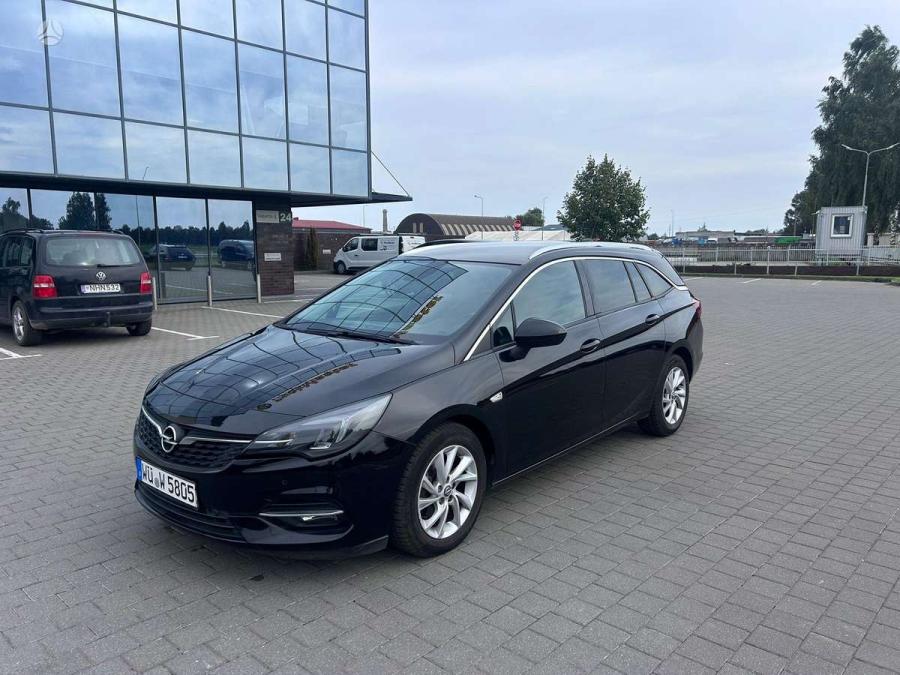Black Opel Astra 2021 in Marijampole, with an engine capacity of 1.34 L and mileage of 190 thousand km for 5590 €, photo 1 on AUTOMOTO.COM.LV
