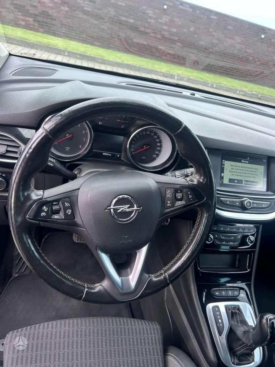 Black Opel Astra 2021 in Marijampole, with an engine capacity of 1.34 L and mileage of 190 thousand km for 5590 €, photo 5 on AUTOMOTO.COM.LV