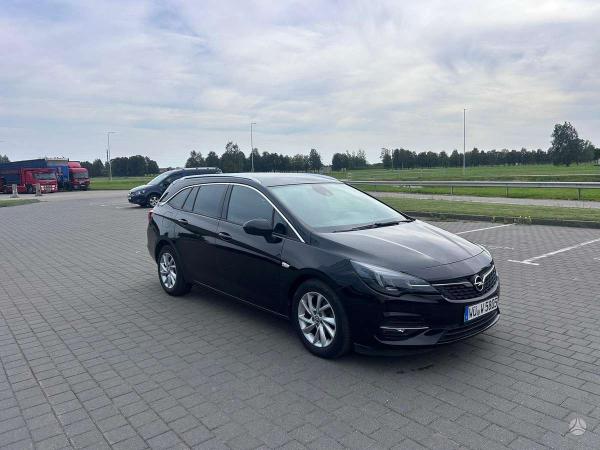 Black Opel Astra 2021 in Marijampole, with an engine capacity of 1.34 L and mileage of 190 thousand km for 5590 €, photo 7 on AUTOMOTO.COM.LV