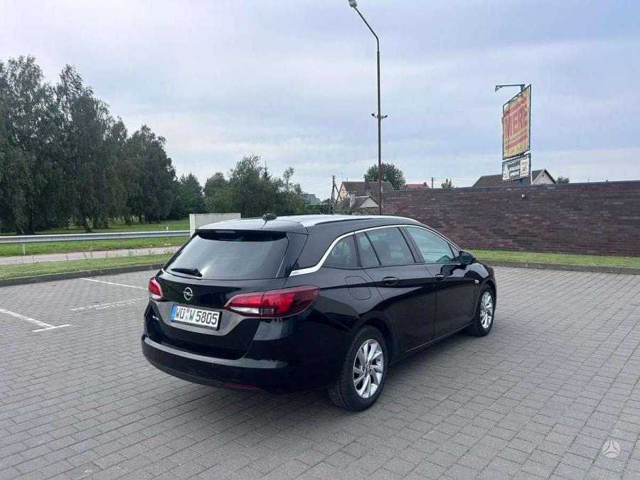 Black Opel Astra 2021 in Marijampole, with an engine capacity of 1.34 L and mileage of 190 thousand km for 5590 €, photo 8 on AUTOMOTO.COM.LV