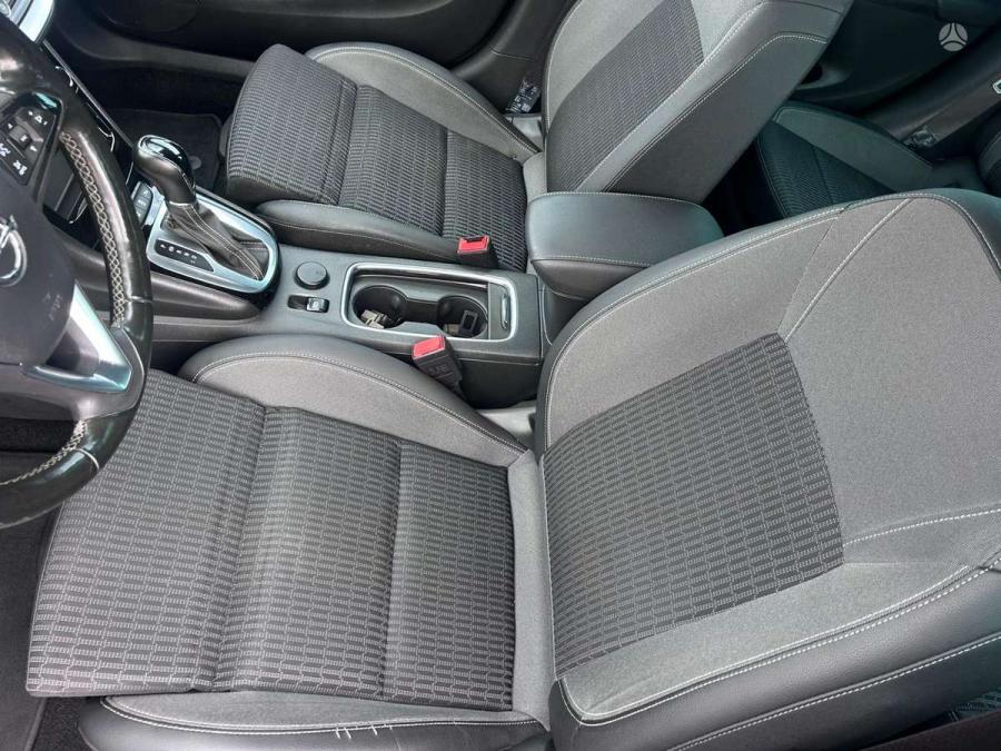 Black Opel Astra 2021 in Marijampole, with an engine capacity of 1.34 L and mileage of 190 thousand km for 5590 €, photo 11 on AUTOMOTO.COM.LV