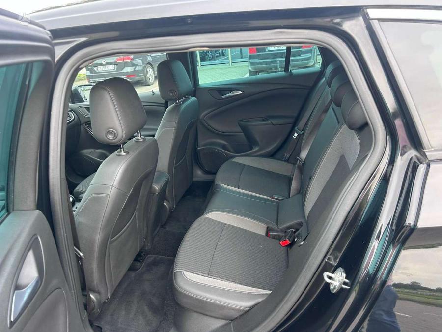 Black Opel Astra 2021 in Marijampole, with an engine capacity of 1.34 L and mileage of 190 thousand km for 5590 €, photo 15 on AUTOMOTO.COM.LV