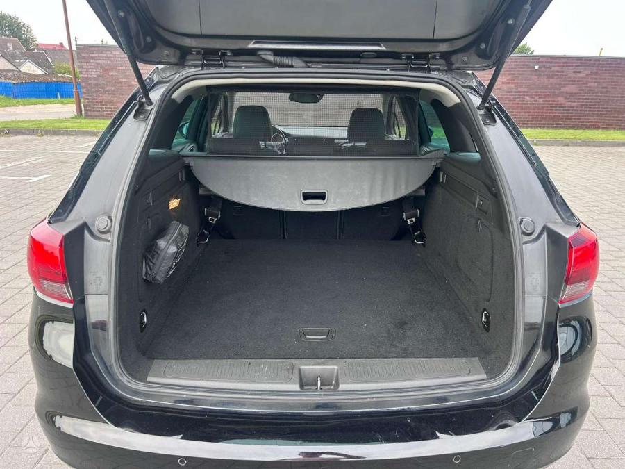 Black Opel Astra 2021 in Marijampole, with an engine capacity of 1.34 L and mileage of 190 thousand km for 5590 €, photo 16 on AUTOMOTO.COM.LV