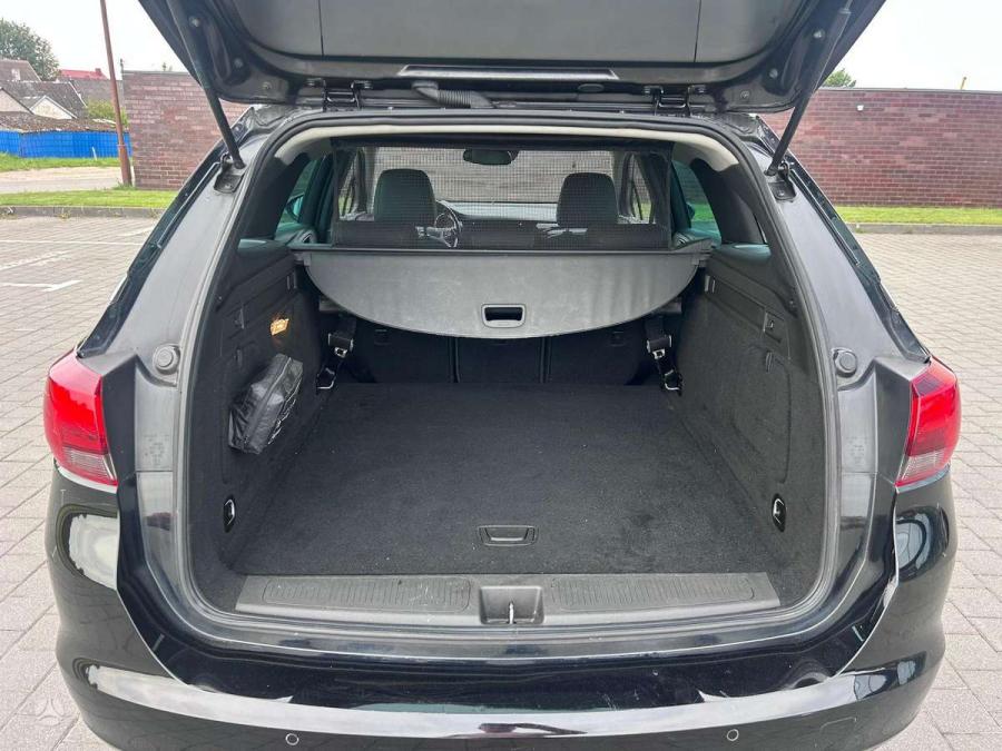 Black Opel Astra 2021 in Marijampole, with an engine capacity of 1.34 L and mileage of 190 thousand km for 5590 €, photo 30 on AUTOMOTO.COM.LV