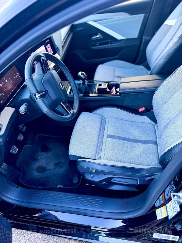 Black Opel Astra 2022 in Viljandi, with an engine capacity of 1.20 L and mileage of 89 thousand km for 16800 €, photo 9 on AUTOMOTO.COM.LV