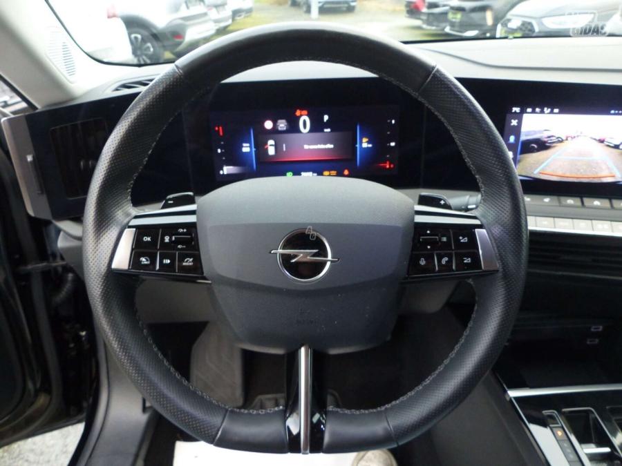 Black Opel Astra 2023 in Kaunas, with an engine capacity of 1.50 L and mileage of 74 thousand km for 22641 €, photo 12 on AUTOMOTO.COM.LV