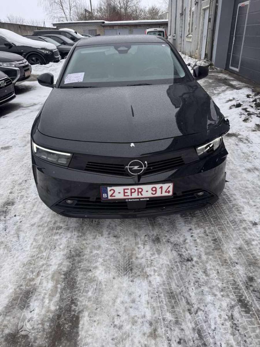 Black Opel Astra 2023 in Vilnius, with an engine capacity of 1.20 L and mileage of 57 thousand km for 9317 €, photo 4 on AUTOMOTO.COM.LV