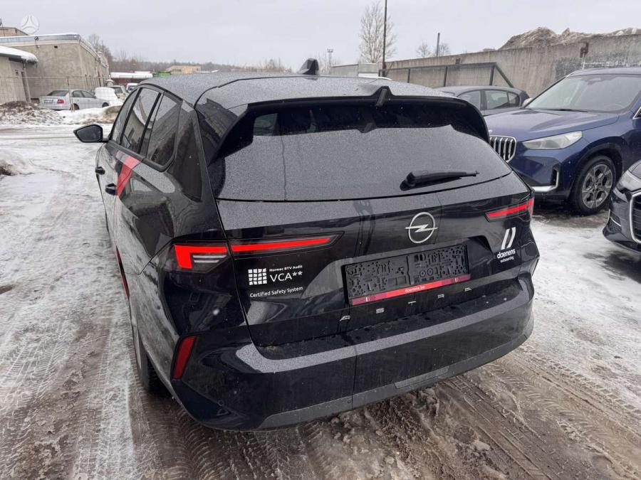 Black Opel Astra 2023 in Vilnius, with an engine capacity of 1.20 L and mileage of 57 thousand km for 9317 €, photo 9 on AUTOMOTO.COM.LV