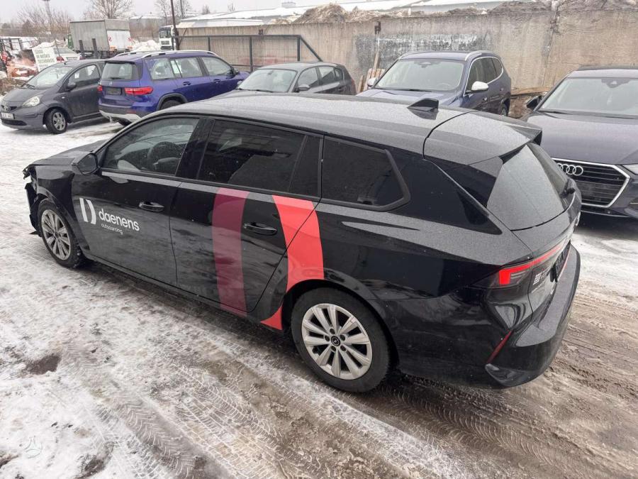 Black Opel Astra 2023 in Vilnius, with an engine capacity of 1.20 L and mileage of 57 thousand km for 9317 €, photo 10 on AUTOMOTO.COM.LV