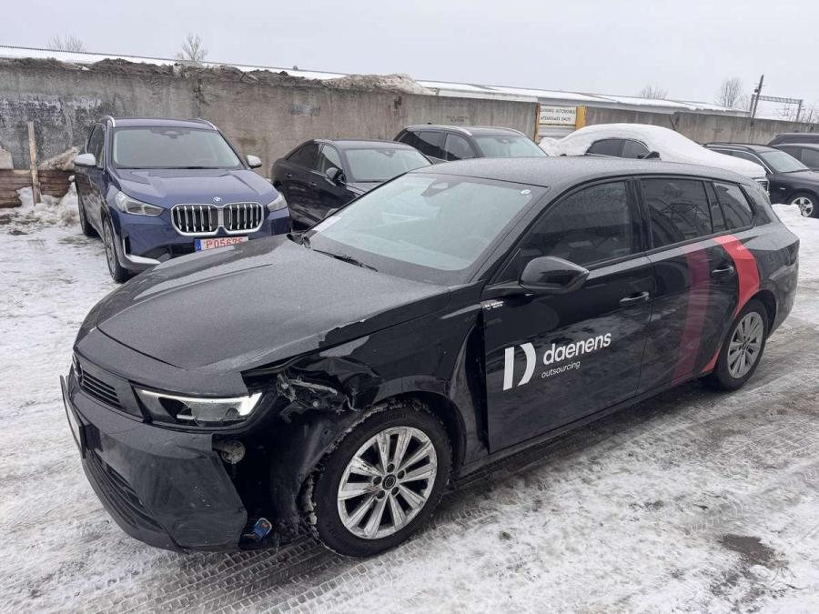 Black Opel Astra 2023 in Vilnius, with an engine capacity of 1.20 L and mileage of 57 thousand km for 9317 €, photo 22 on AUTOMOTO.COM.LV