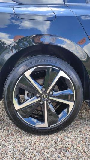 Black Opel Astra 2023 in Vilnius, with an engine capacity of 1.50 L and mileage of 78 thousand km for 18392 €, photo 13 on AUTOMOTO.COM.LV