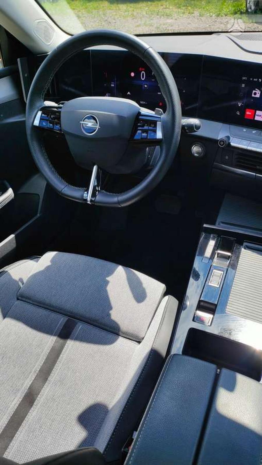 Black Opel Astra 2023 in Vilnius, with an engine capacity of 1.50 L and mileage of 78 thousand km for 18392 €, photo 16 on AUTOMOTO.COM.LV