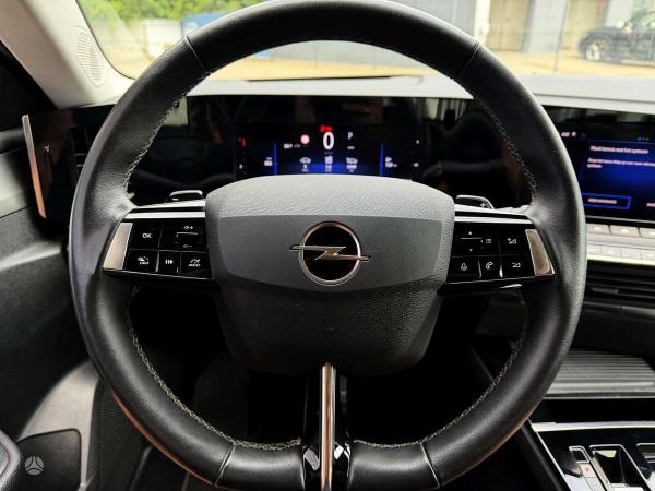 Black Opel Astra 2023 in Kaunas, with an engine capacity of 1.20 L and mileage of 130 thousand km for 13900 €, photo 6 on AUTOMOTO.COM.LV