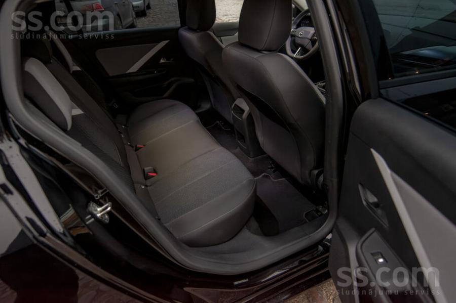 Black Opel Astra 2024 in Jelgava, with an engine capacity of 1.20 L and mileage of 12 thousand km for 17900 €, photo 14 on AUTOMOTO.COM.LV