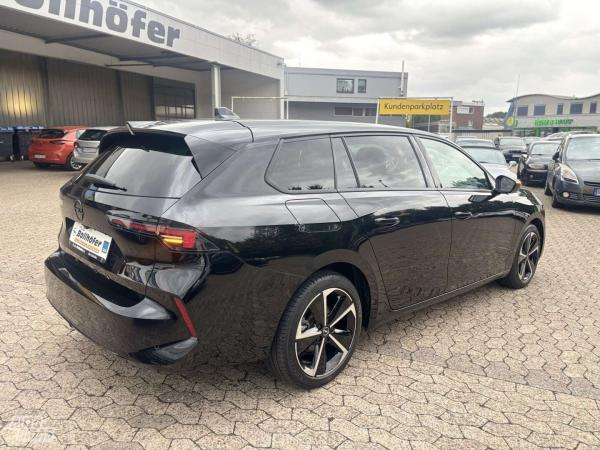 Black Opel Astra 2024 in Kaunas, with an engine capacity of 1.20 L and mileage of 21 thousand km for 24618 €, photo 4 on AUTOMOTO.COM.LV