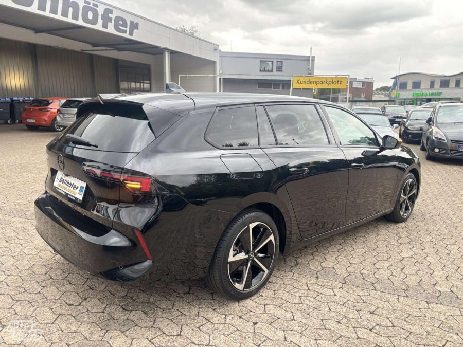Black Opel Astra 2024 in Kaunas, with an engine capacity of 1.20 L and mileage of 21 thousand km for 24618 €, photo 4 on AUTOMOTO.COM.LV