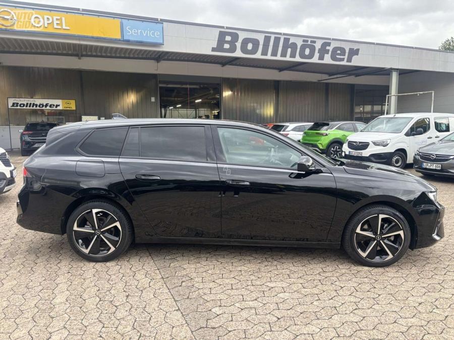 Black Opel Astra 2024 in Kaunas, with an engine capacity of 1.20 L and mileage of 21 thousand km for 24618 €, photo 5 on AUTOMOTO.COM.LV