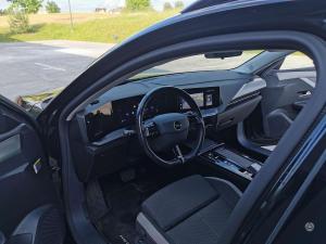 Black Opel Astra 2024 in Kaunas, with an engine capacity of 1.20 L and mileage of 59 thousand km for 15900 €, photo 11 on AUTOMOTO.COM.LV