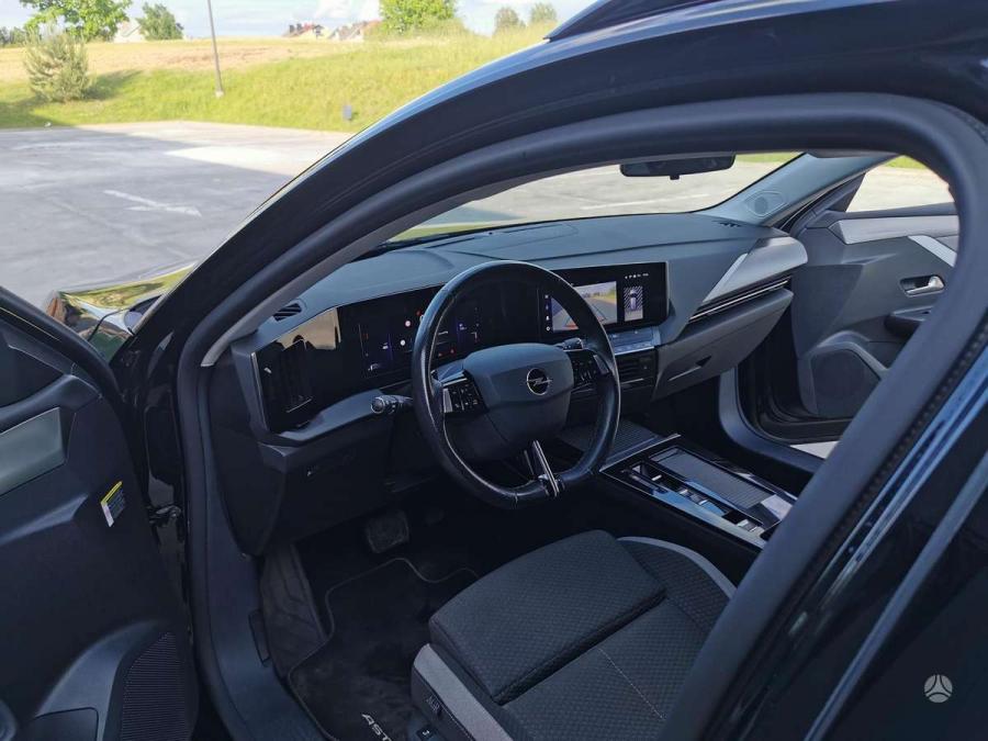 Black Opel Astra 2024 in Kaunas, with an engine capacity of 1.20 L and mileage of 59 thousand km for 15900 €, photo 11 on AUTOMOTO.COM.LV