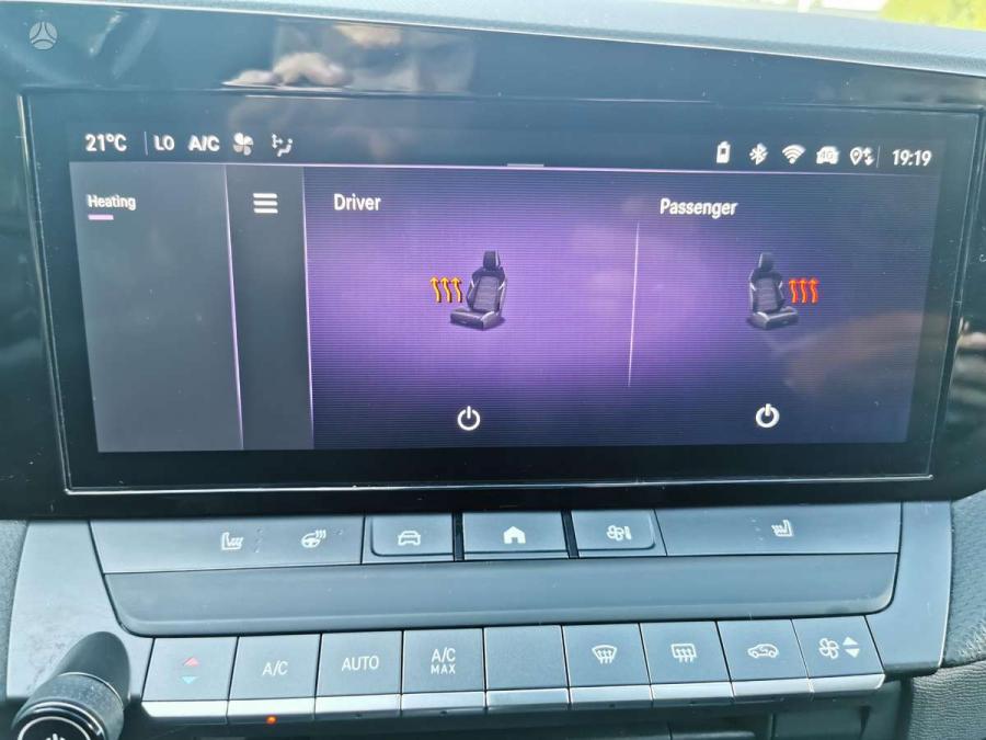 Black Opel Astra 2024 in Kaunas, with an engine capacity of 1.20 L and mileage of 59 thousand km for 15900 €, photo 12 on AUTOMOTO.COM.LV