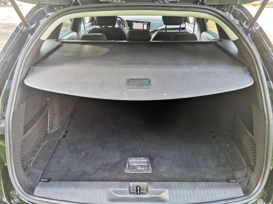 Black Opel Astra 2024 in Kaunas, with an engine capacity of 1.20 L and mileage of 59 thousand km for 15900 €, photo 15 on AUTOMOTO.COM.LV