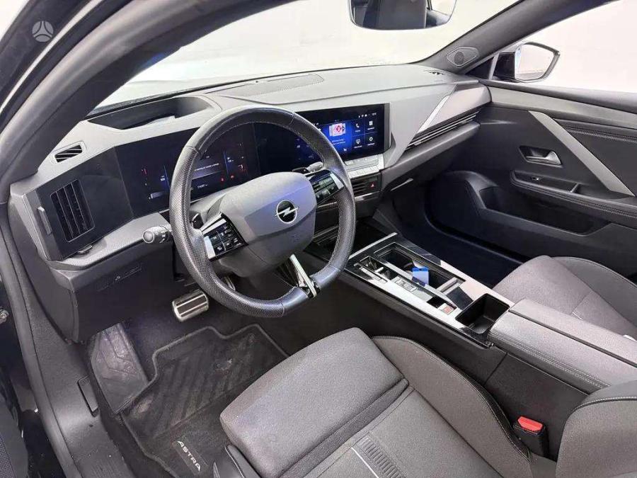 Black Opel Astra 2024 in Vilnius, with an engine capacity of 1.50 L and mileage of 216 thousand km for 12800 €, photo 3 on AUTOMOTO.COM.LV