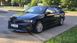 Black Opel Astra 2025 in Riga, with an engine capacity of 1.20 L and mileage of 15 thousand km for 20200 €, photo 1 on AUTOMOTO.COM.LV