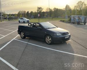 Zils Opel Astra 2002 Rīga, ar dzinēja tilpumu 1.60 L un nobraukumu 262 tūkst. km par 1800 €, foto  vietnē AUTOMOTO.COM.LV