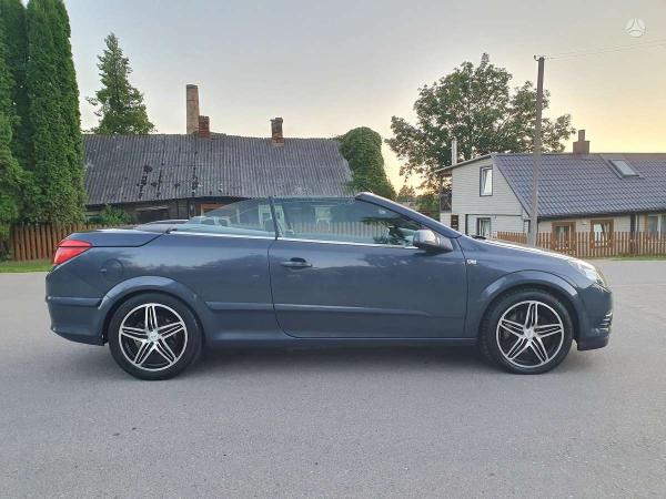 Blue Opel Astra 2008 in Vilkaviskis, with an engine capacity of 1.90 L and mileage of 260 thousand km for 1850 €, photo 9 on AUTOMOTO.COM.LV