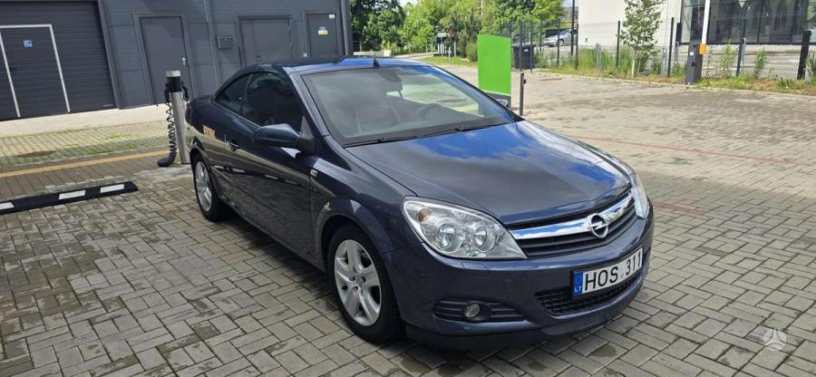 Zils Opel Astra 2008 Viļņa, ar dzinēja tilpumu 1.80 L un nobraukumu 193 tūkst. km par 2300 €, foto 14 vietnē AUTOMOTO.COM.LV