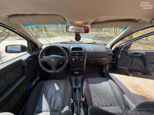Blue Opel Astra 1998 in Vilnius, with an engine capacity of 1.60 L and mileage of 221 thousand km for 900 €, photo 12 on AUTOMOTO.COM.LV