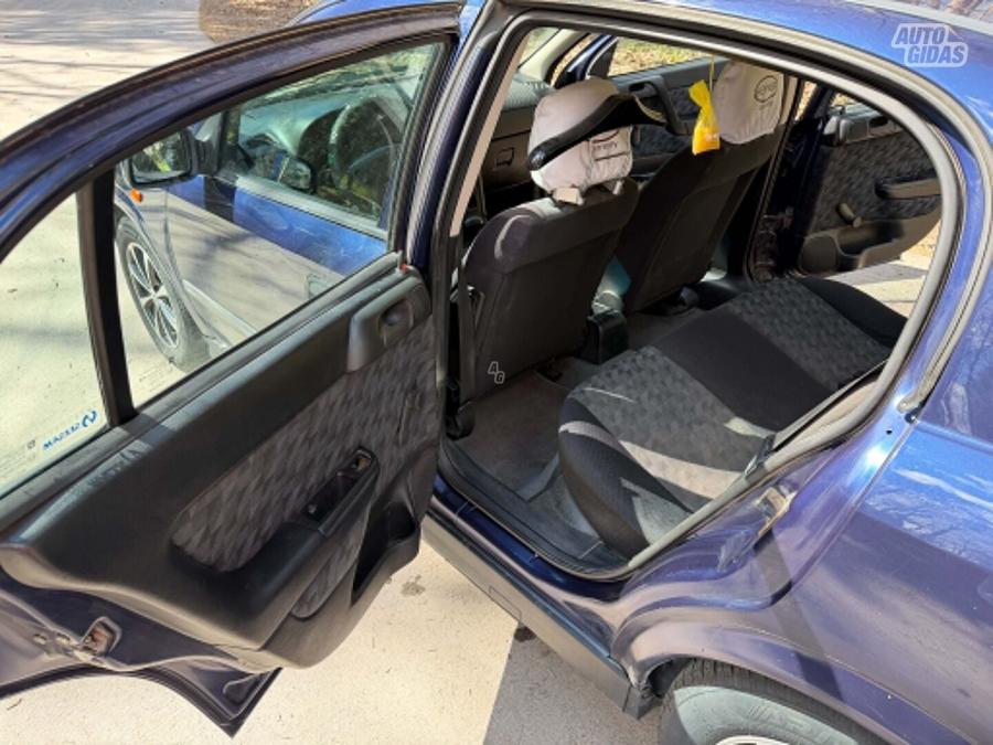 Blue Opel Astra 1998 in Vilnius, with an engine capacity of 1.60 L and mileage of 221 thousand km for 900 €, photo 16 on AUTOMOTO.COM.LV