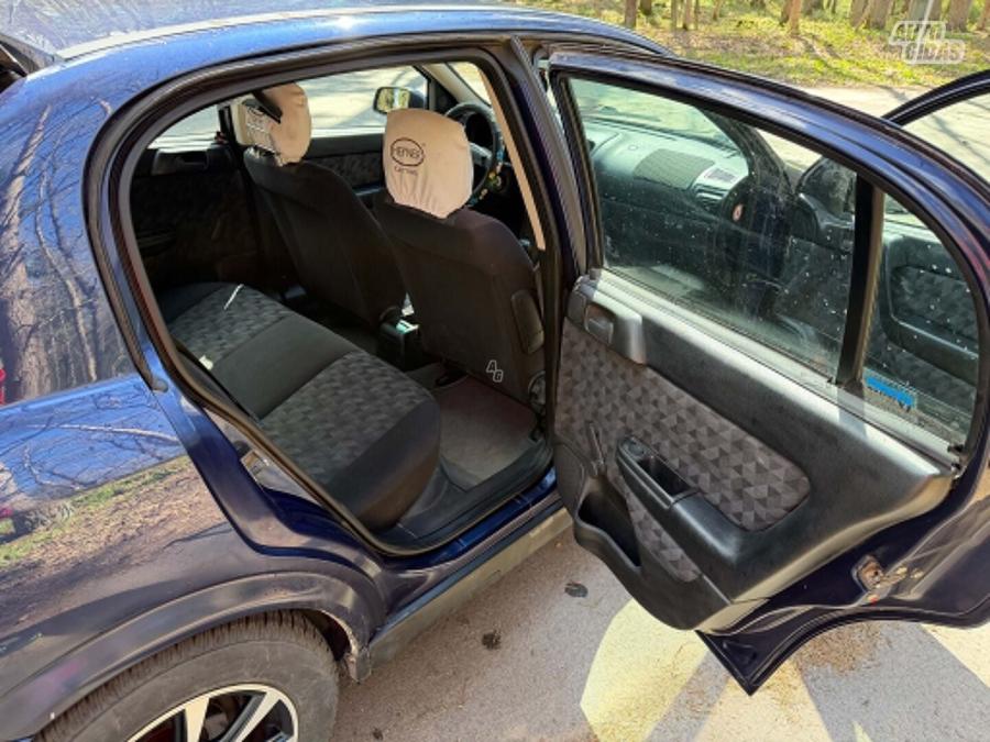 Blue Opel Astra 1998 in Vilnius, with an engine capacity of 1.60 L and mileage of 221 thousand km for 900 €, photo 18 on AUTOMOTO.COM.LV