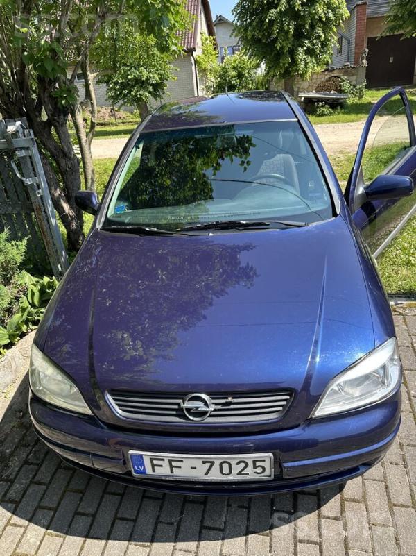 Zils Opel Astra 1999 Ogre, ar dzinēja tilpumu 1.60 L un nobraukumu 145 tūkst. km par 700 €, foto 2 vietnē AUTOMOTO.COM.LV