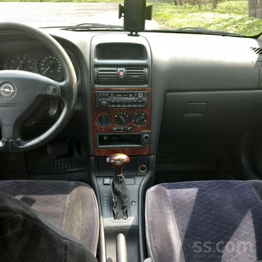 Zils Opel Astra 1999 Rīga, ar dzinēja tilpumu 1.80 L un nobraukumu 298 tūkst. km par 1000 €, foto 4 vietnē AUTOMOTO.COM.LV