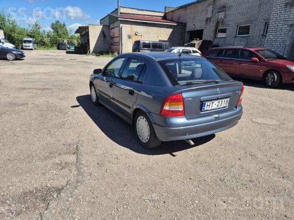 Zils Opel Astra 1999 Ludza, ar dzinēja tilpumu 1.60 L un nobraukumu 163 tūkst. km par 900 €, foto 7 vietnē AUTOMOTO.COM.LV