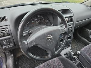 Zils Opel Astra 2000 Prienai, ar dzinēja tilpumu 1.60 L un nobraukumu 202 tūkst. km par 999 €, foto 12 vietnē AUTOMOTO.COM.LV