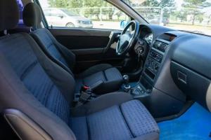 Blue Opel Astra 2000 in Liepaja, with an engine capacity of 2.00 L and mileage of 304 thousand km for 2850 €, photo 13 on AUTOMOTO.COM.LV
