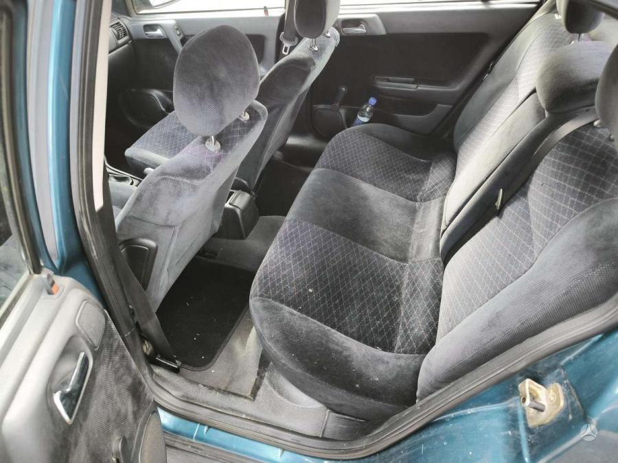 Blue Opel Astra 2000 in Siauliai, with an engine capacity of 1.60 L and mileage of 208 thousand km for 550 €, photo 13 on AUTOMOTO.COM.LV