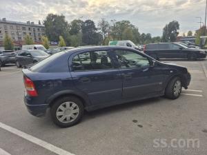 Zils Opel Astra 2001 Rīga, ar dzinēja tilpumu 1.60 L un nobraukumu 241 tūkst. km par 990 €, foto 10 vietnē AUTOMOTO.COM.LV