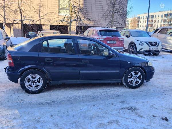 Blue Opel Astra 2002 in Vilnius, with an engine capacity of 2.00 L and mileage of 236 thousand km for 1250 €, photo 4 on AUTOMOTO.COM.LV