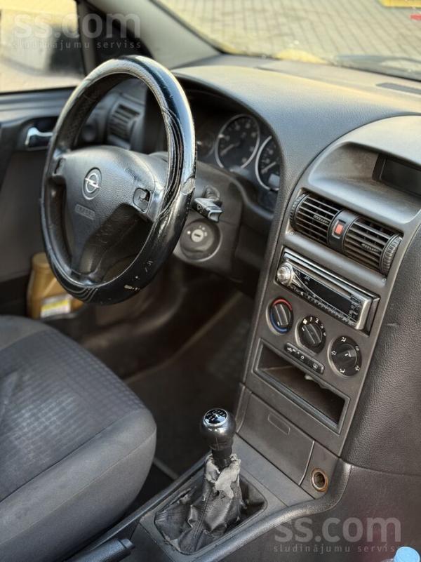 Zils Opel Astra 2004 Jūrmala, ar dzinēja tilpumu 1.70 L un nobraukumu 272 tūkst. km par 800 €, foto 5 vietnē AUTOMOTO.COM.LV